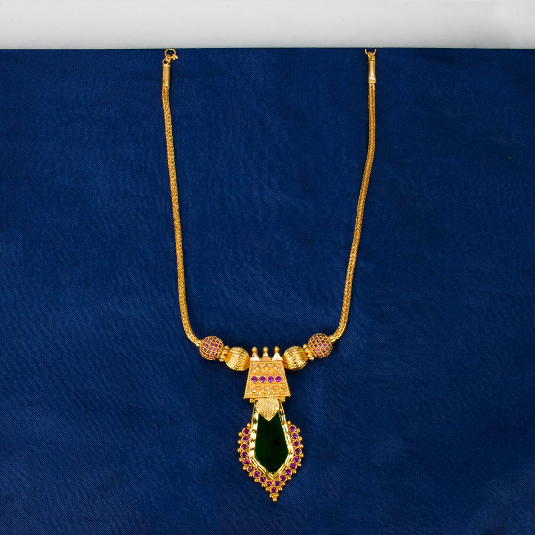 Classy Gold Plated Ruby Stones Nagapadam Pendant Necklace Kollam Supreme